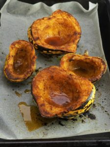Moroccan Spiced Baked Stuffed Squash, roasted tomato sauce, chickpeas